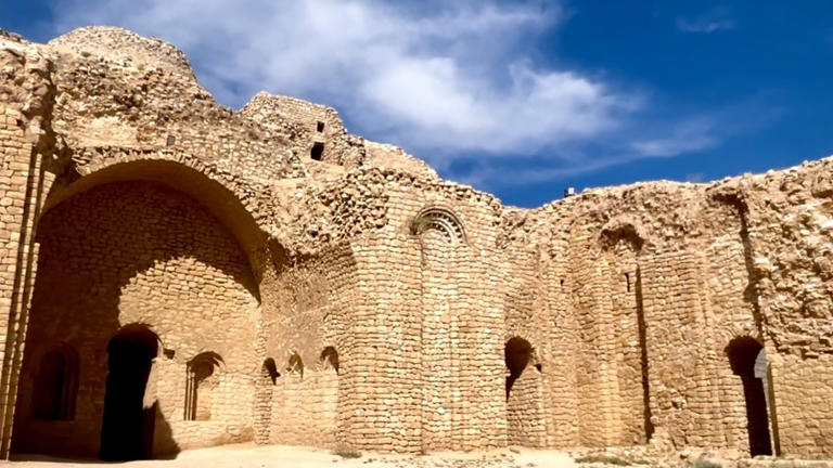 A Byzantine monastery with a central church and Coptic inscriptions ...