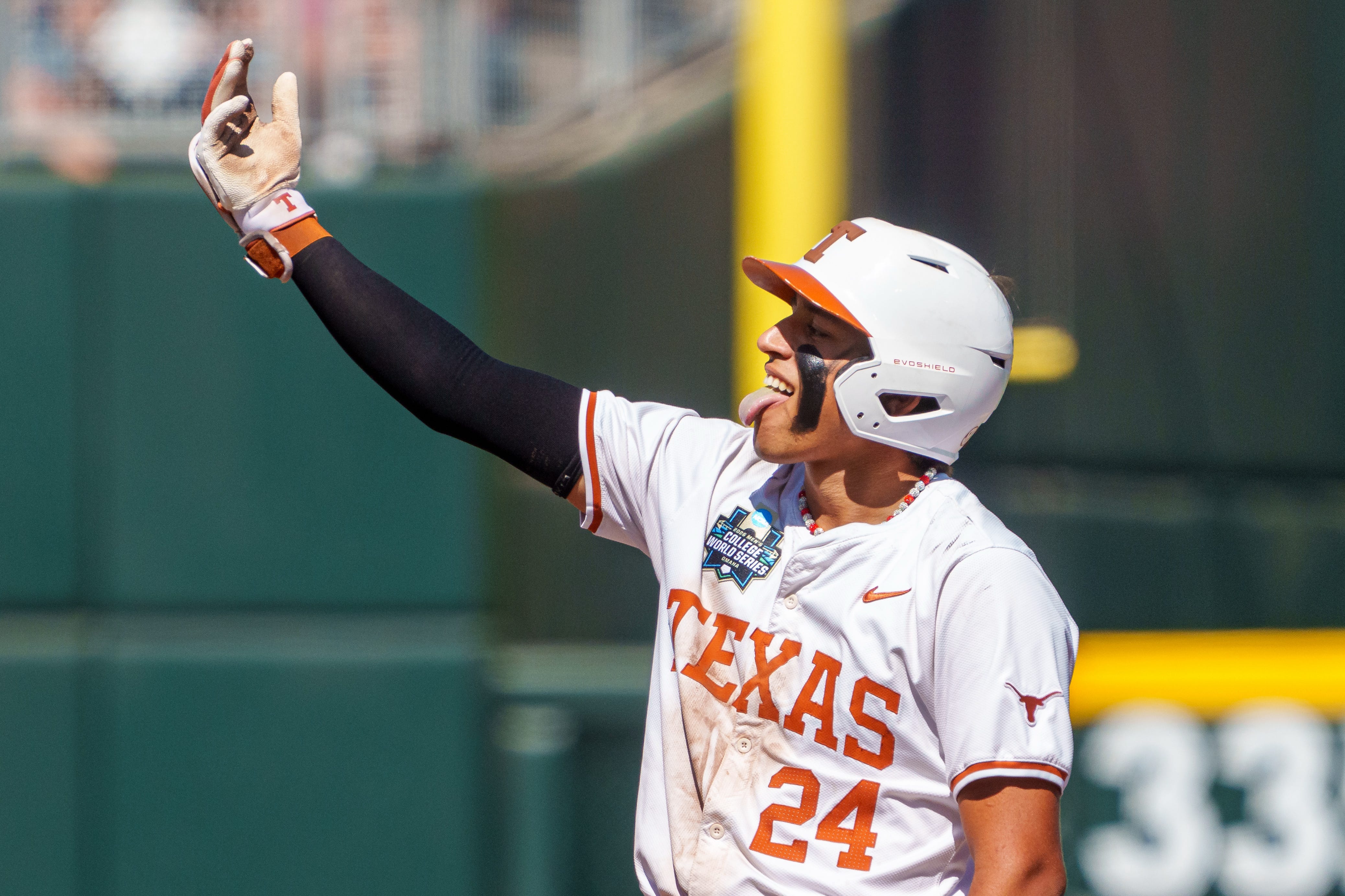 Rodriquez hits for cycle, 7 RBIs as Texas survives CWS elimination