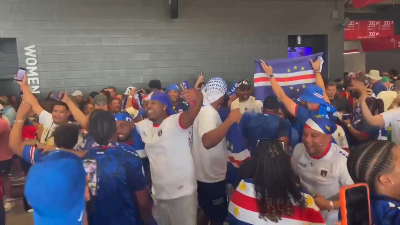 Cape Verde fans celebrate the World Cup draw while Spain supporters ...