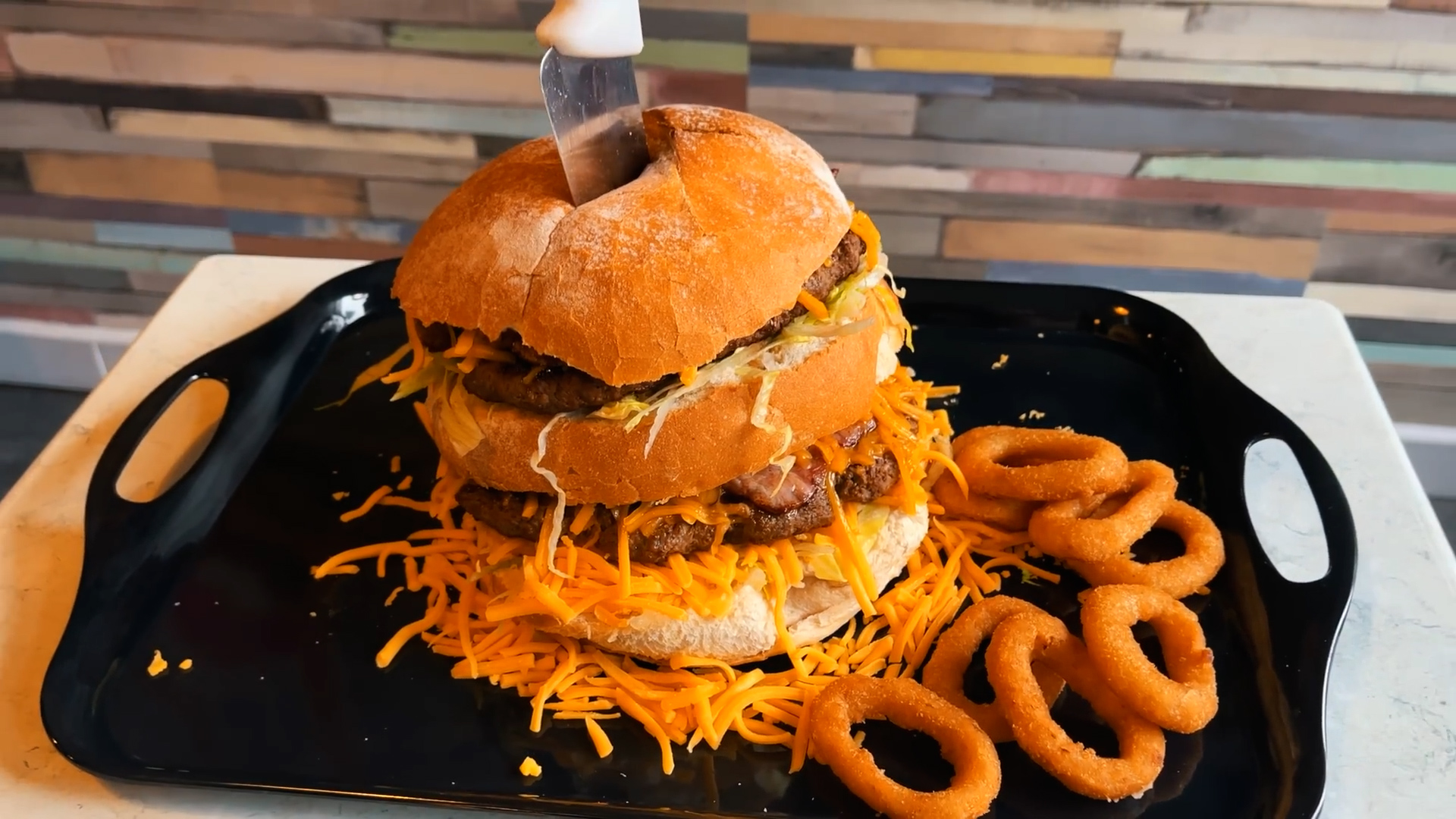 Man tries to finish a burger so big only one person had beaten it