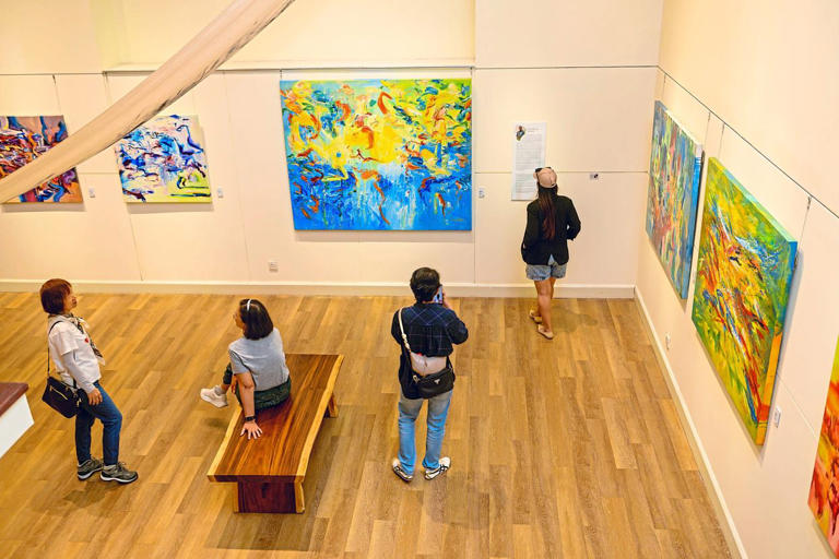 Mixing it up at art show to inspire social harmony