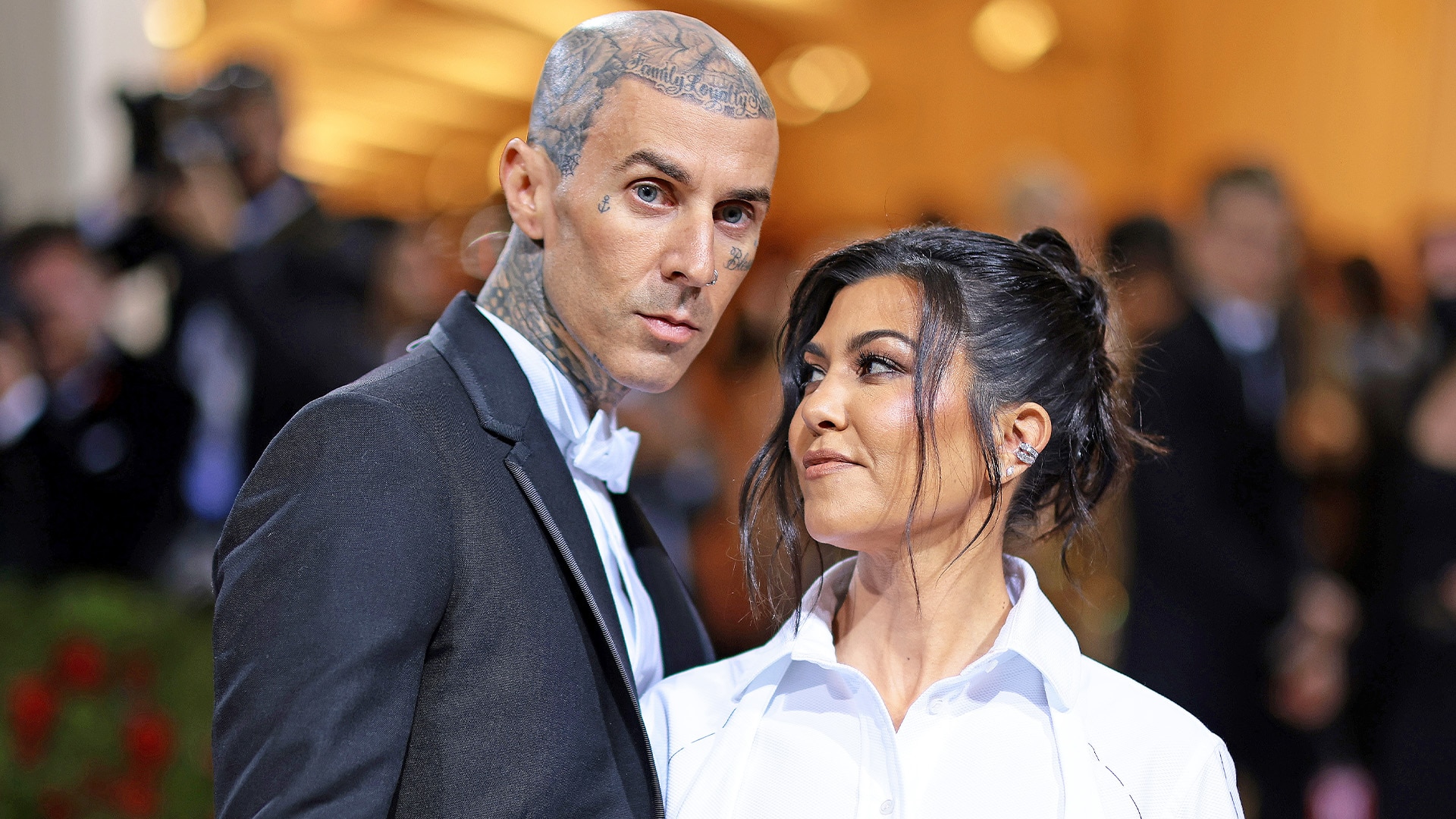 Kourtney Kardashian & Travis Barker have rare red carpet date night