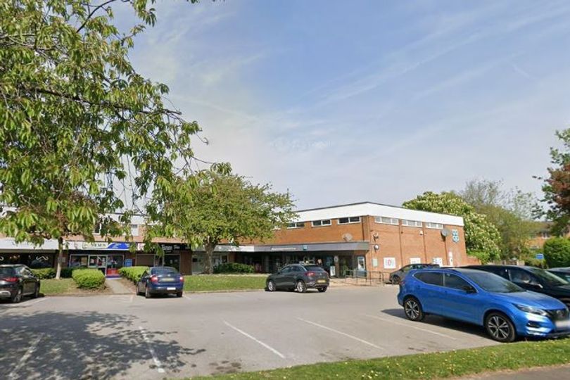 Investigation underway after woman found dead in back of car in Stockport