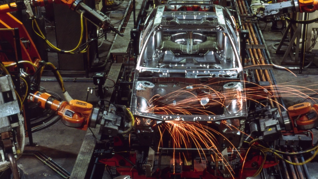 US factory output stalls in May as AI offsets trade drag