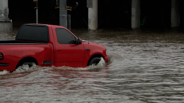 Flooded streets strand drivers on Houston's north side as more rain ...