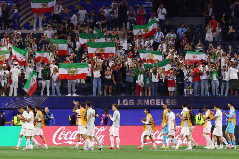 Soccer-boos, cheers and a draw: Iran's World Cup opener reflects deep ...