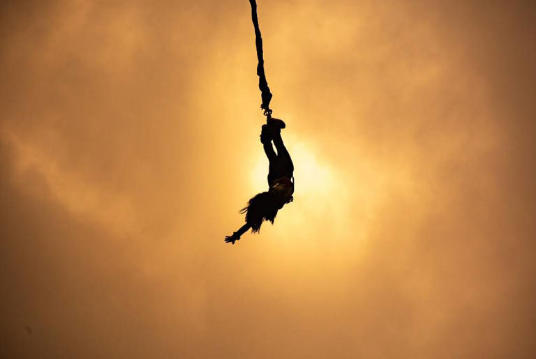 Woman dies after safety cord left off in Brazil rope jump