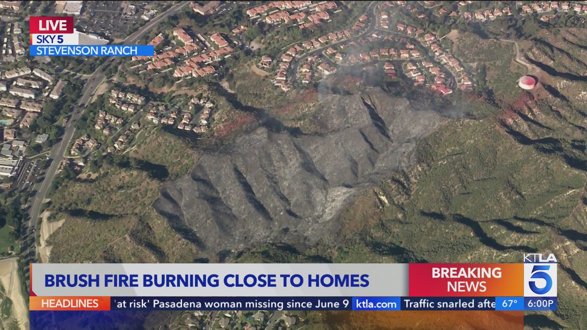 Stevenson Ranch brush fire burns close to nearby homes