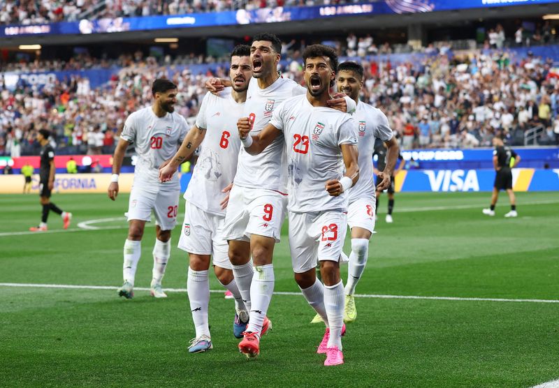 Soccer-Iran draw with New Zealand in politically charged World Cup ...