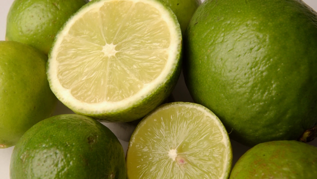 Origins, traits, and uses of key and Persian limes