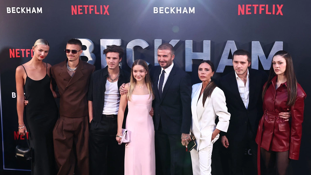 Romeo and Cruz Beckham back Harper amid staging claims