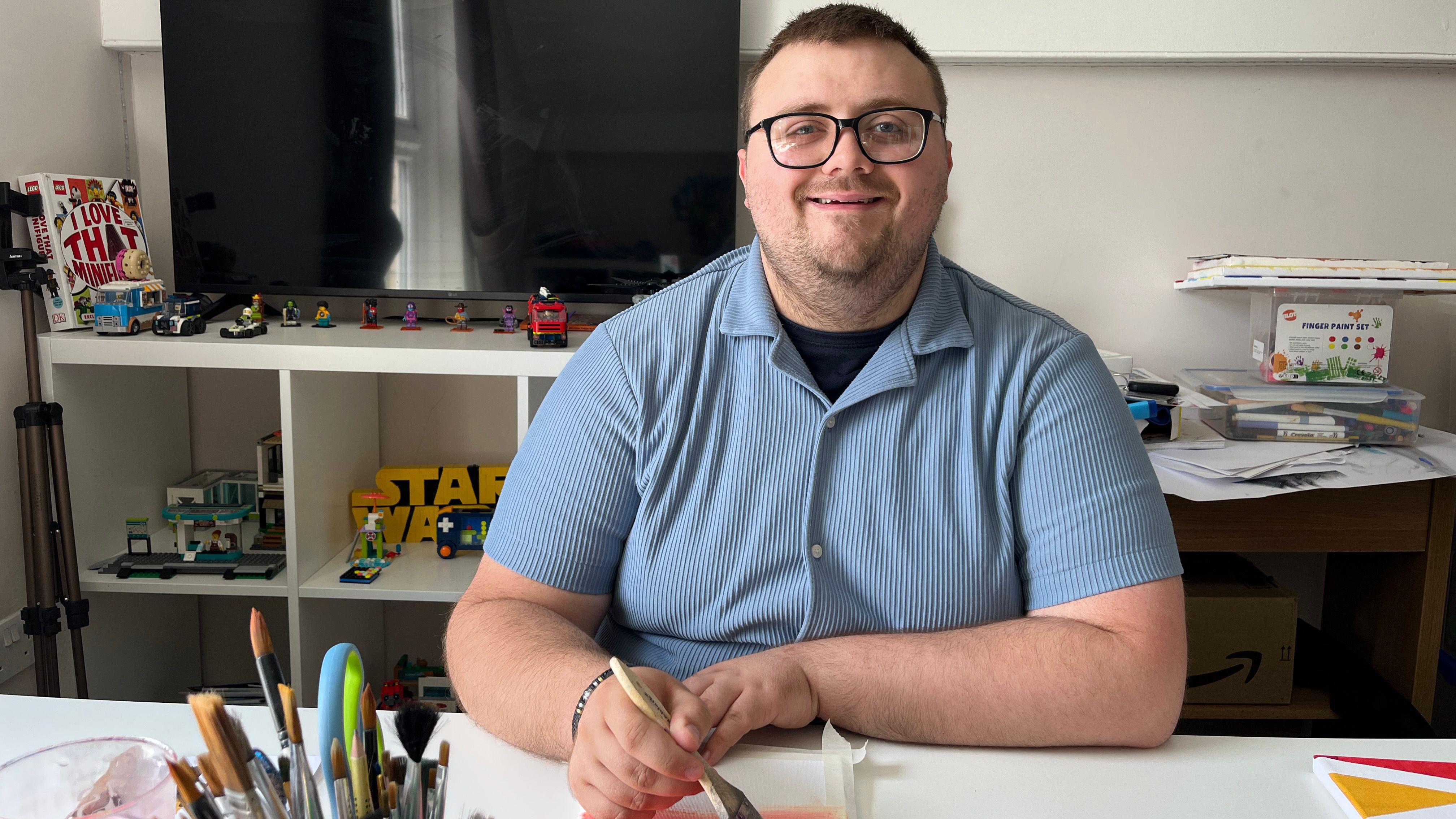 Sir Richard Branson praises autistic artist's work