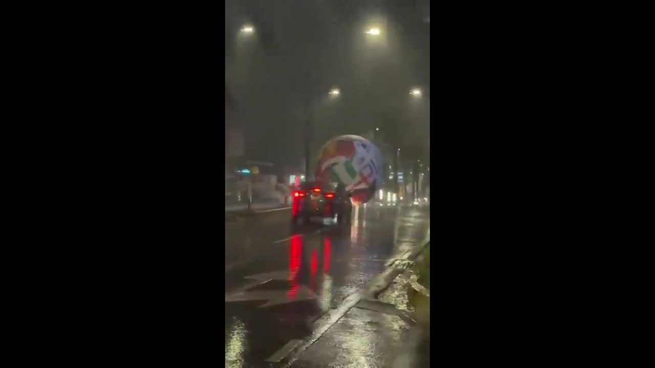 Flooded streets turn into giant soccer game as World Cup fever grips ...