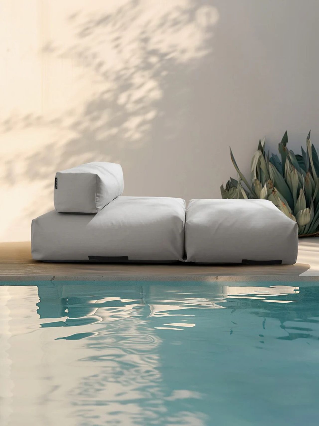 This luxurious floating pool lounger is the hottest way to cool down ...