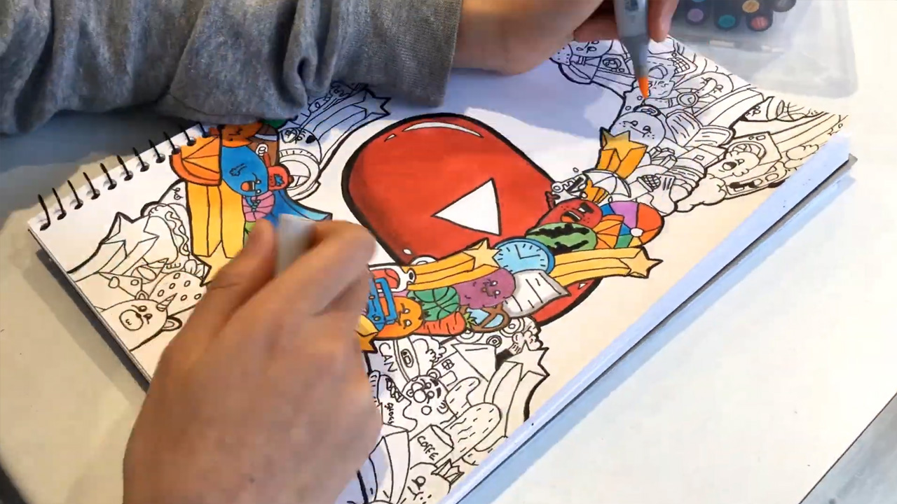 Drawing a doodle of the famous play button