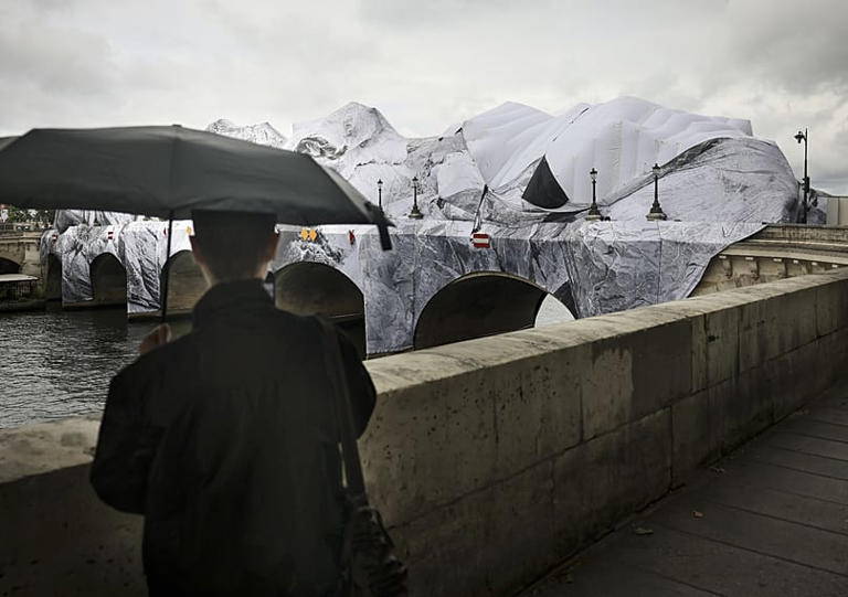 A cave for a crowd: French artist JR opens 'Caverne' art work on Pont ...