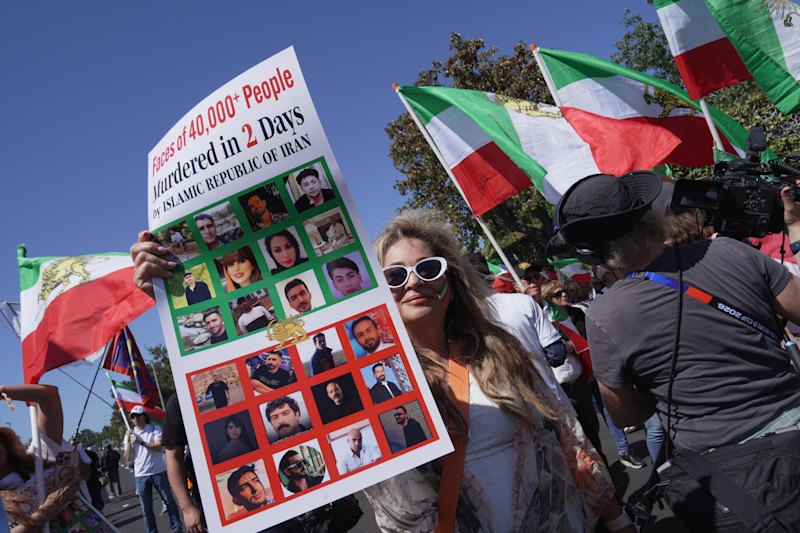 Flag spat on, anthem snubbed as Iran divides World Cup before epic draw