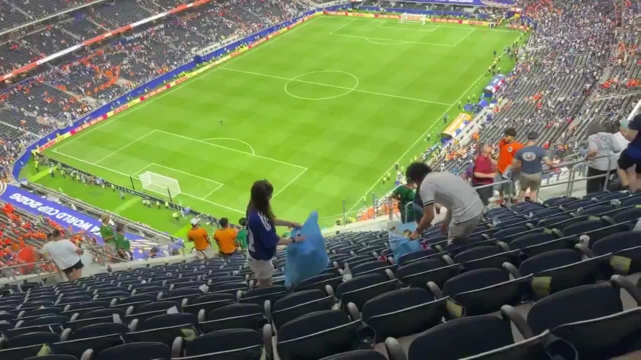 Polite Japan fans clear rubbish from stadium after game against the ...