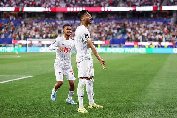 Iran goalscorer sparks outrage with 'gun' celebration at World Cup