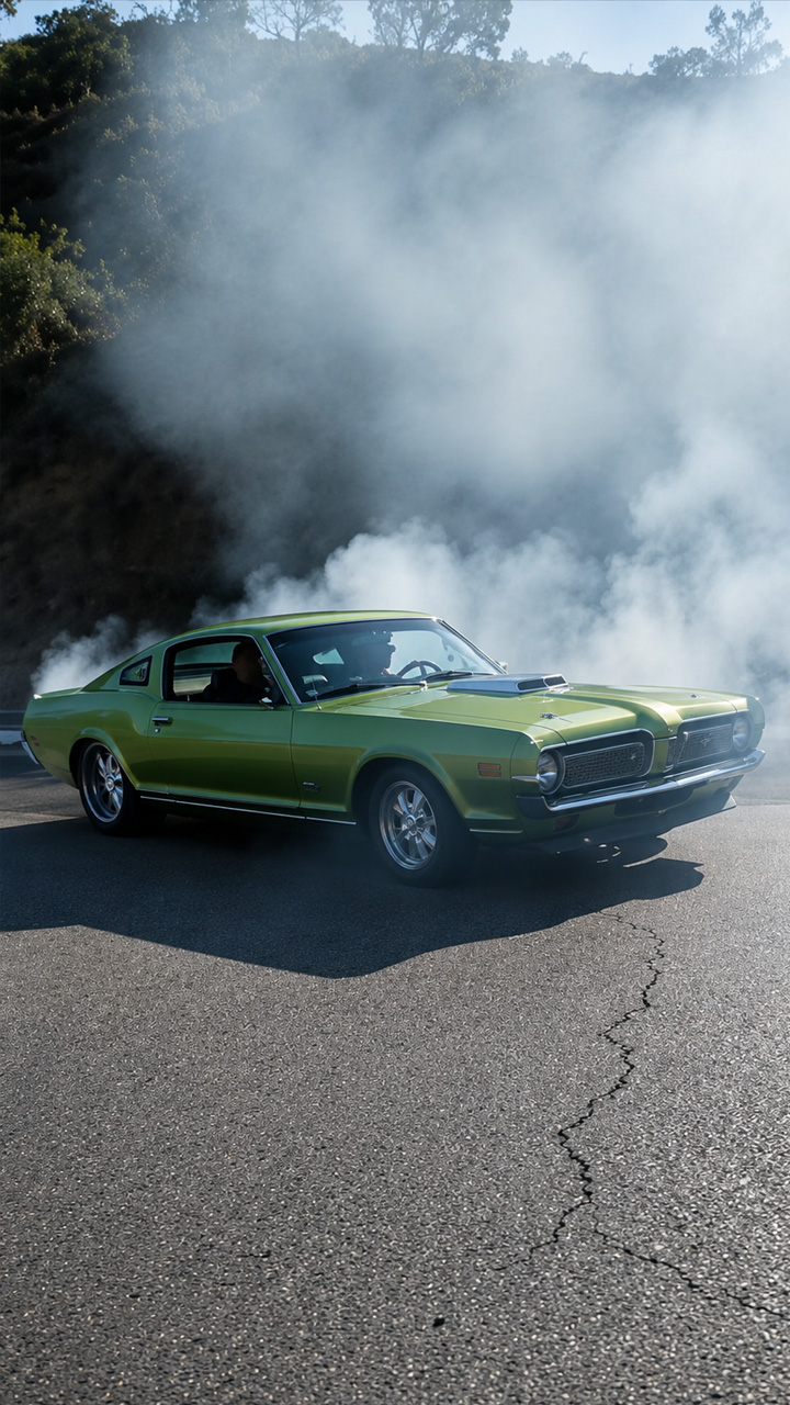 Muscle car drifts hard through the corner