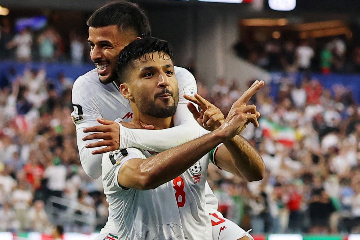 Iran striker sparks outrage over 'gun' celebration in World Cup clash