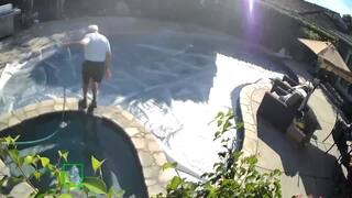 Elderly man takes unexpected fall into covered pool