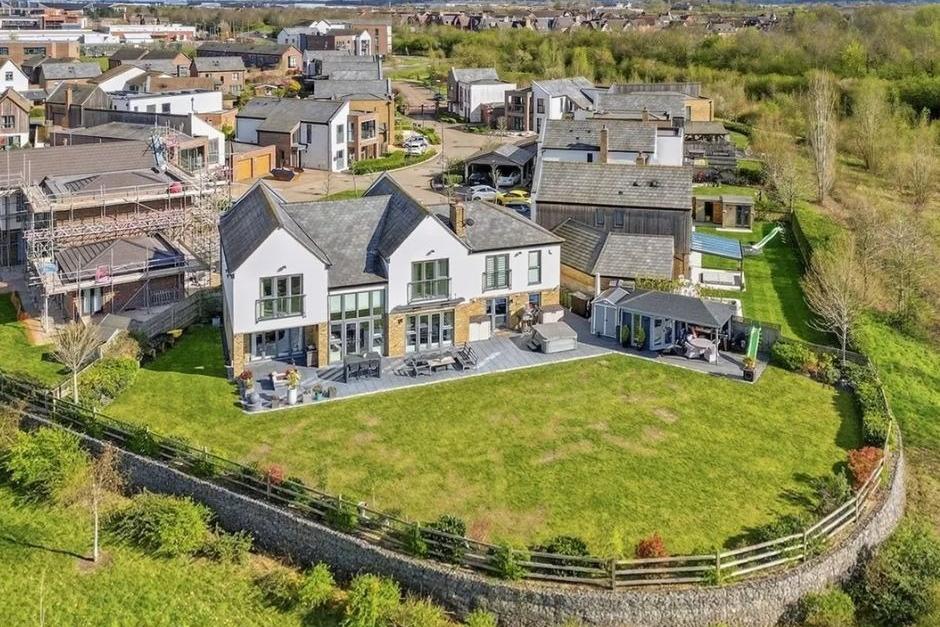 In pictures: Stunning five-bed home on exclusive gated island in Milton ...