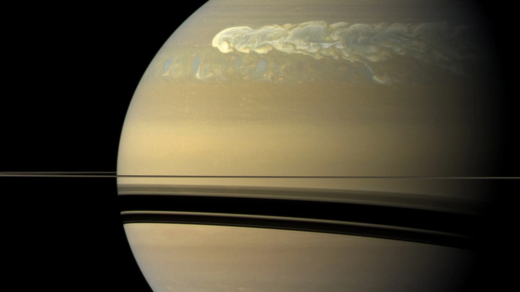 Saturn’s atmosphere, rings, and moons in detail