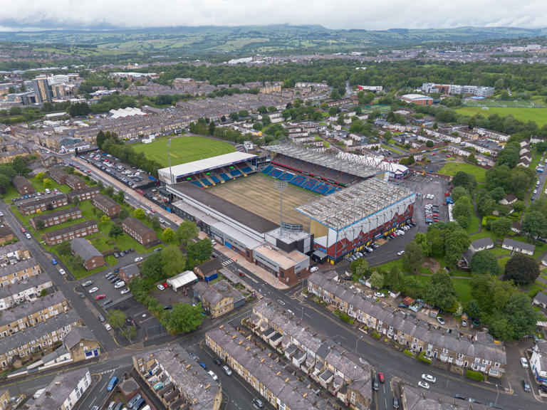 Picture gallery as work begins on Burnley's Turf Moor pitch ahead of ...