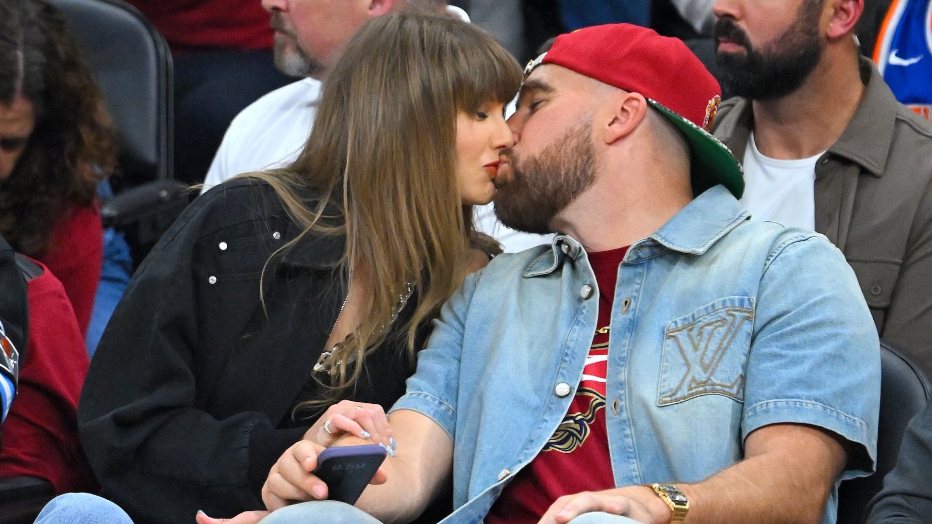 Travis Kelce honors Taylor Swift with romantic movie poster at LA live show