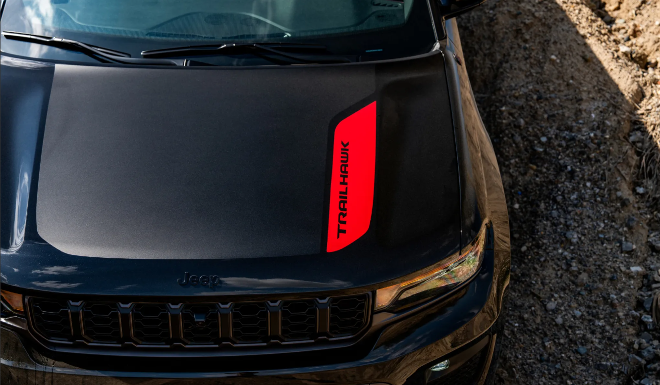 30.5-inch all-terrain tires, six skid plates, and the Grand Cherokee ...