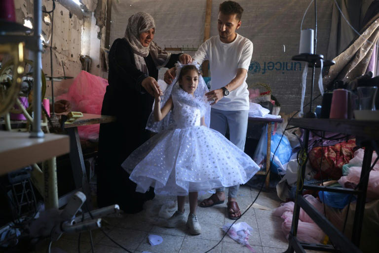 Gaza tailor turns waste fabrics into dresses for girls