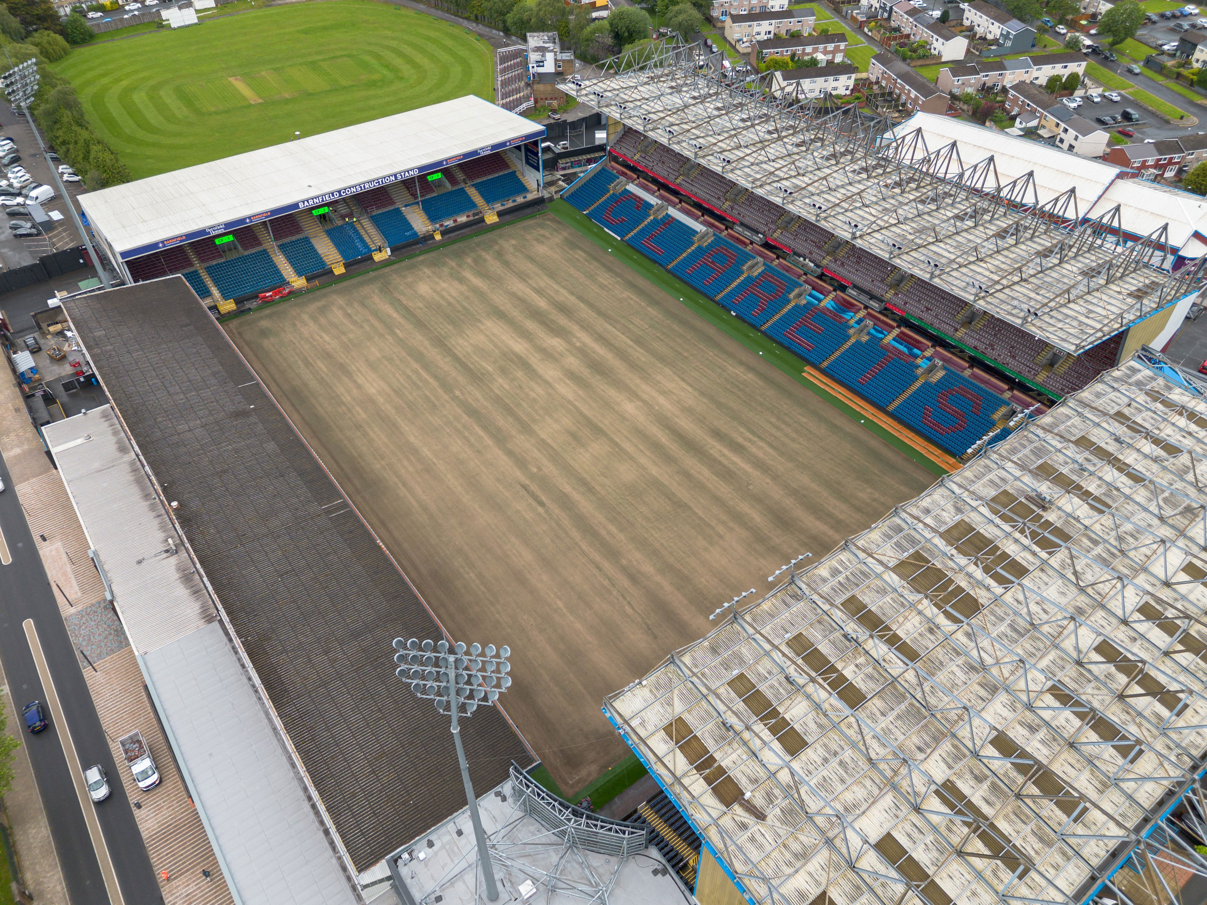 Picture gallery as work begins on Burnley's Turf Moor pitch ahead of ...