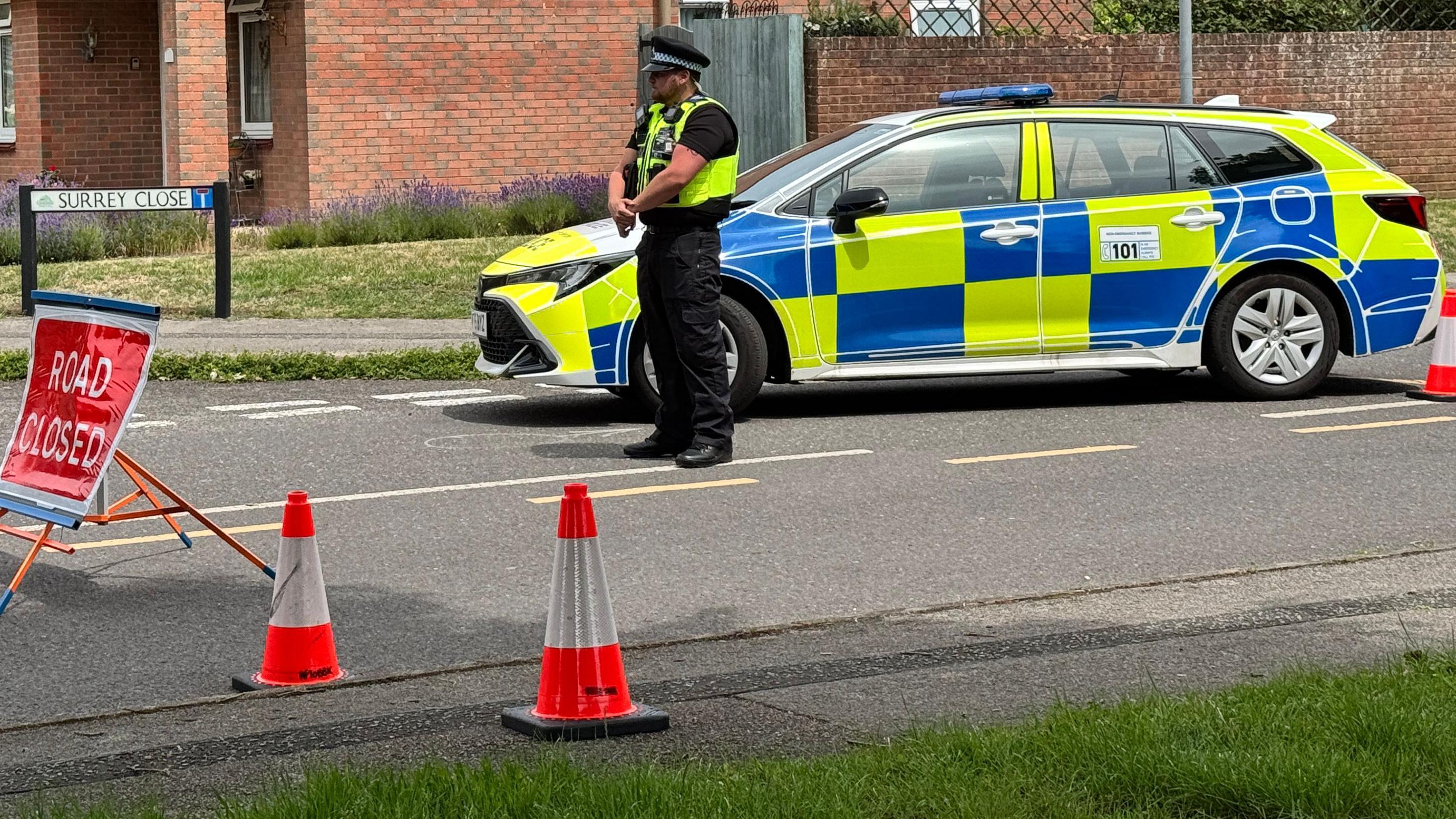Three held as cordon remains over suspect device
