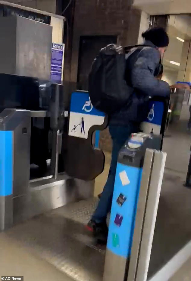Moment Gucci jacket-wearing fare dodger barges through Tube barriers ...