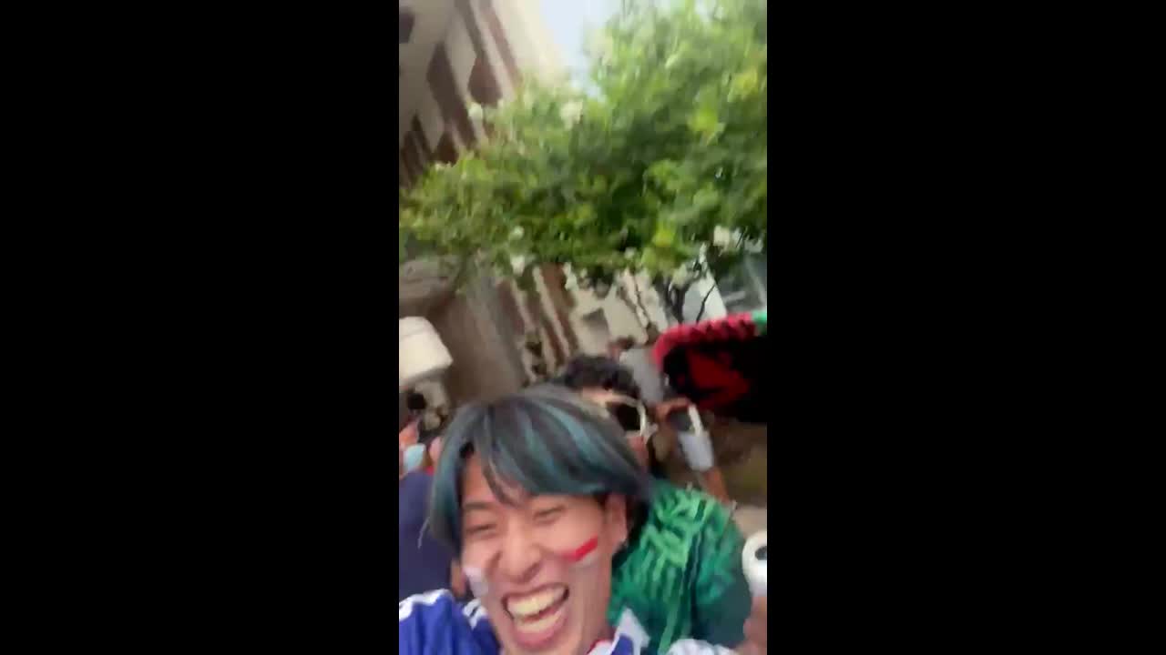 Japanese and Dutch fans celebrate World Cup draw at public viewing in Texas
