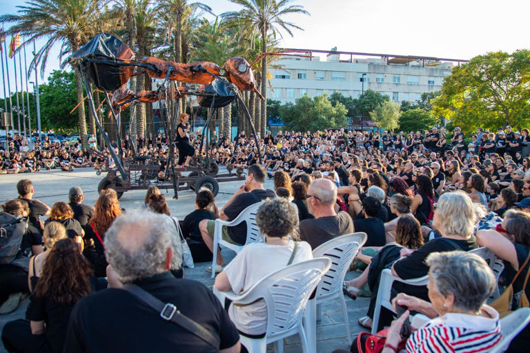Menorca anti-tourism protest sees giant ant puppets swarm the streets