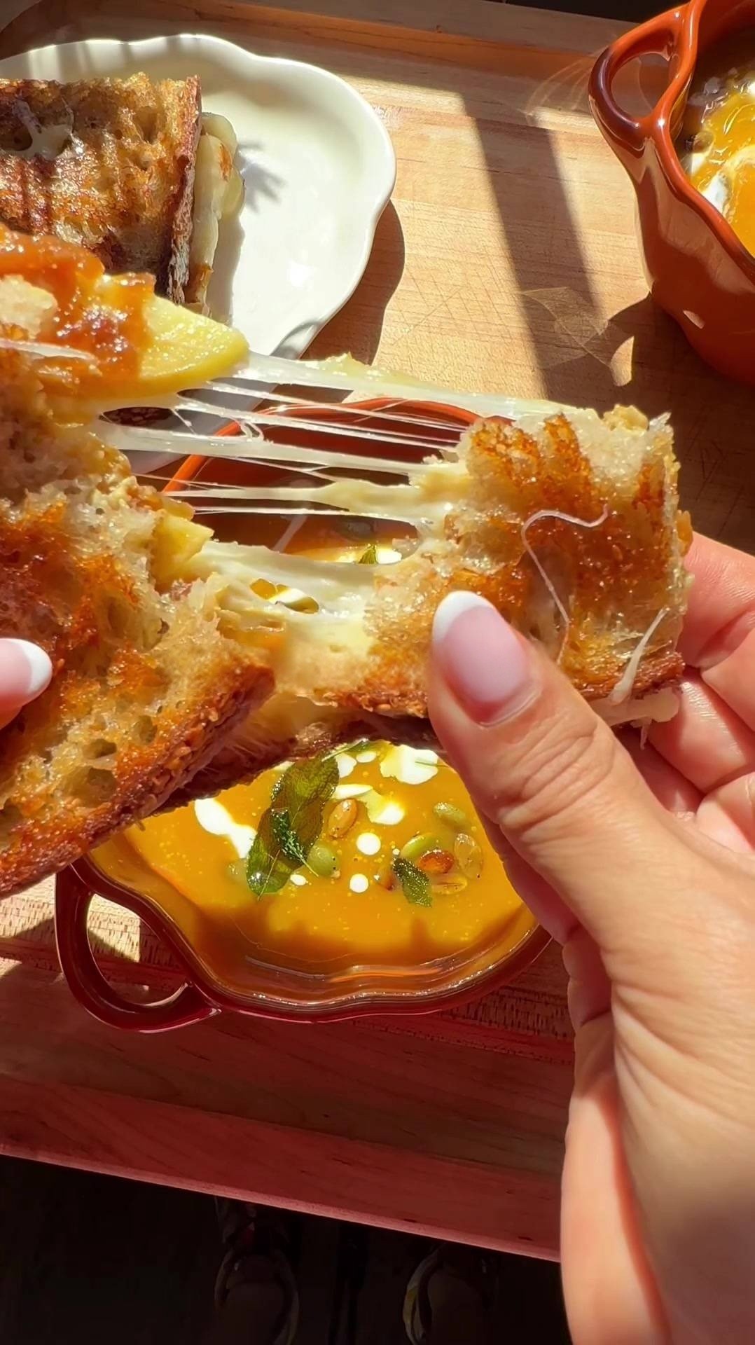 Apple cheddar grilled cheese with delicious, caramelized onion