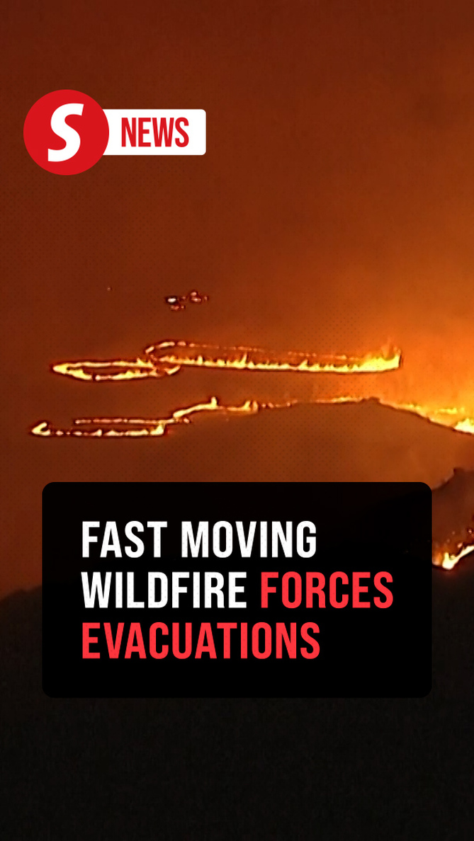Wildfires burn through night in California county, evacuations underway