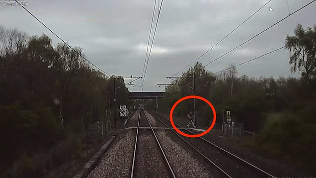 Jogger narrowly misses being hit by 100mph train