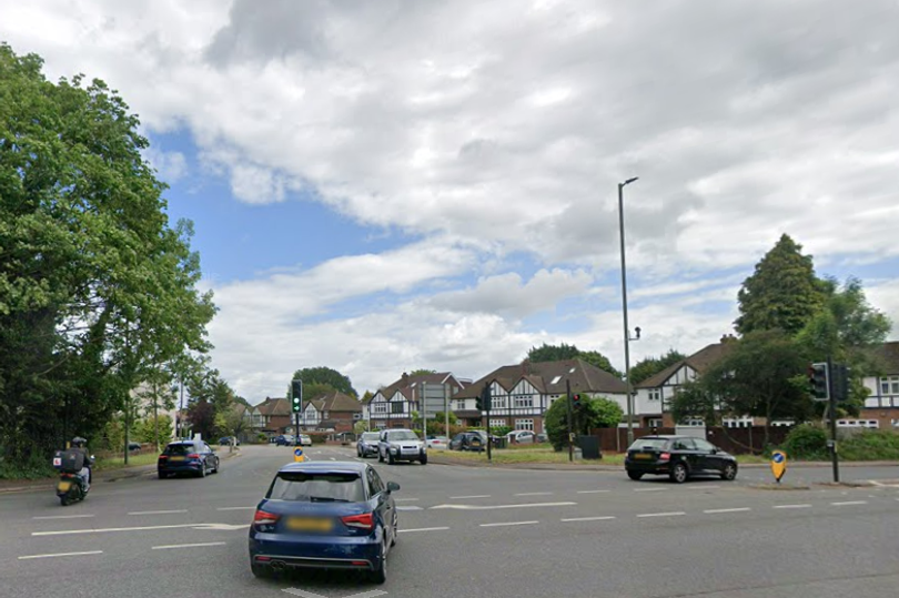 Surrey road closed for hours after bus and ambulance crash