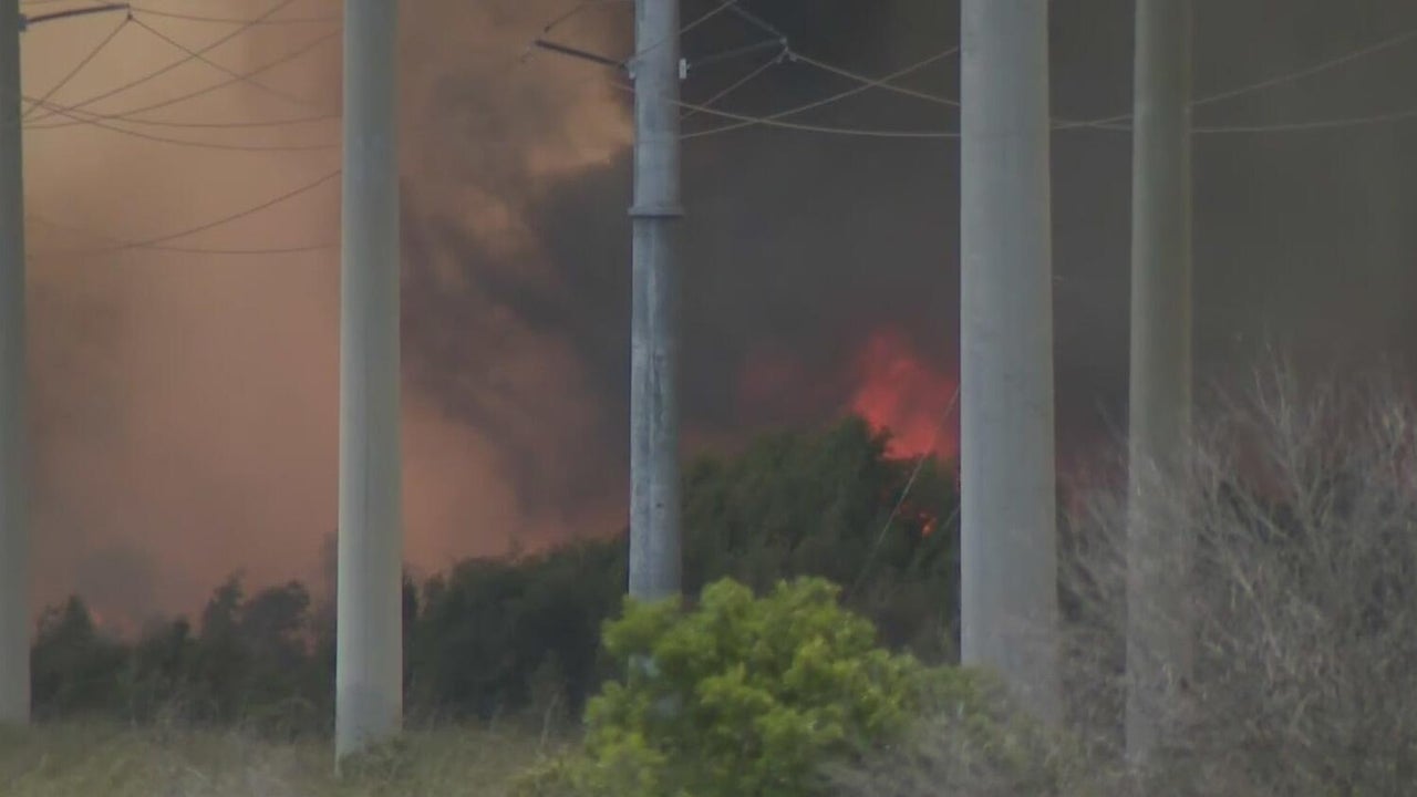 Miami-Dade wildfire continues burning near electrical grid, prison