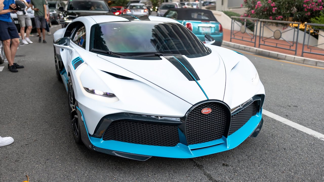Exclusive fleet of supercars gathering after dark