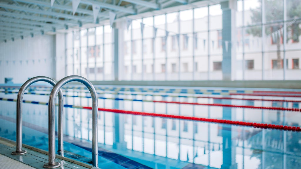 Minnesota swim coach accused of grooming student's sister via text