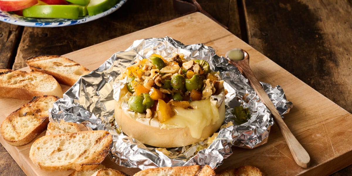 Ree Drummond's loaded campfire baked brie turns warm and melty over the ...