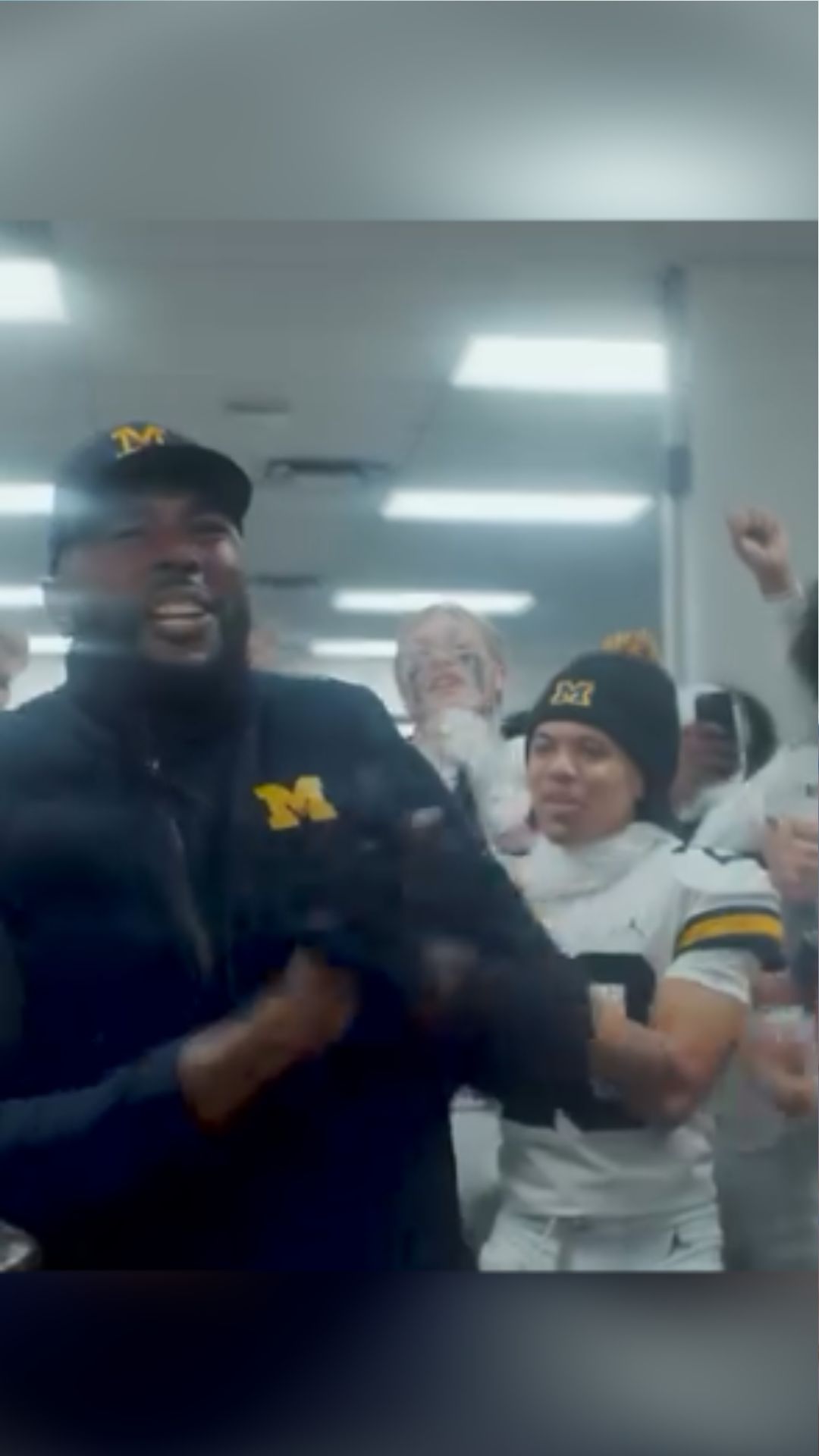 Coach Sherrone Moore singing Michigan fight song with team (December 2024)