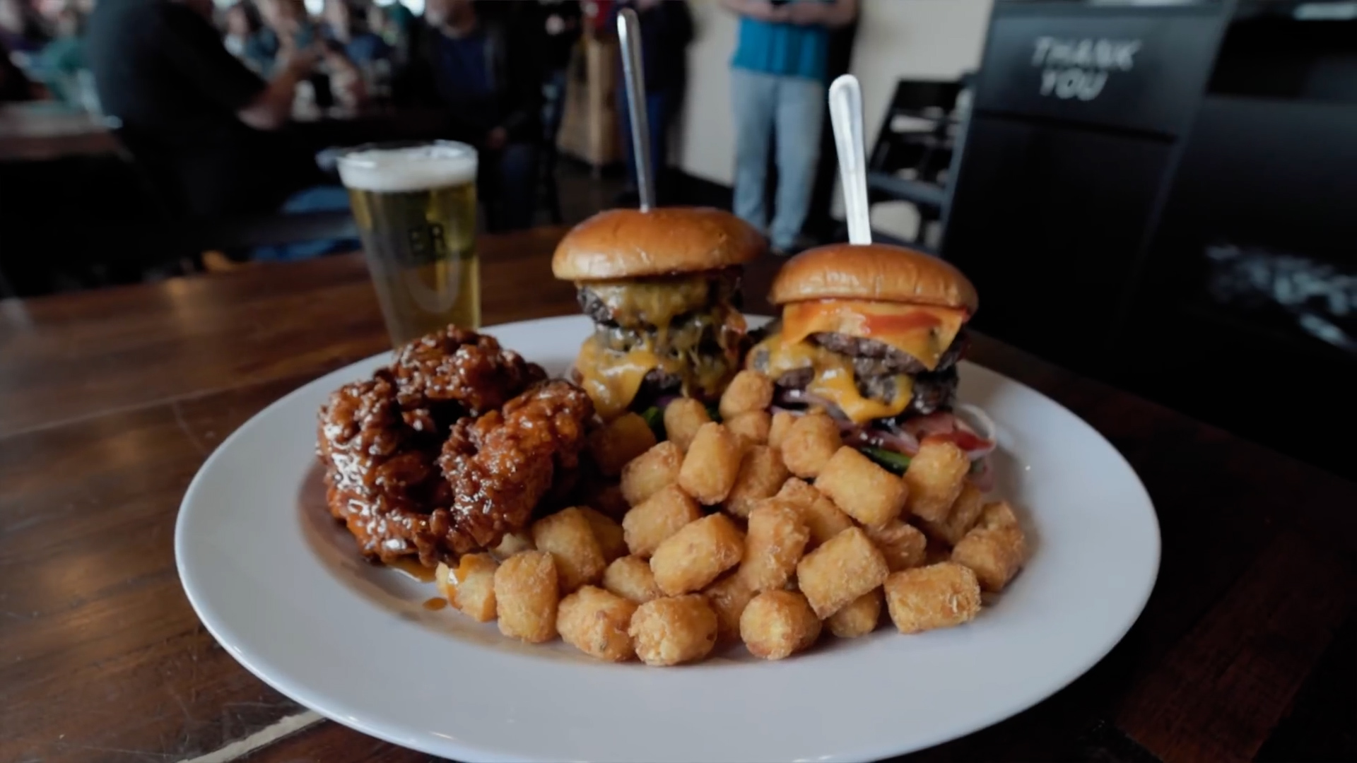 Woman tries to beat undefeated burger challenge loaded with burgers ...