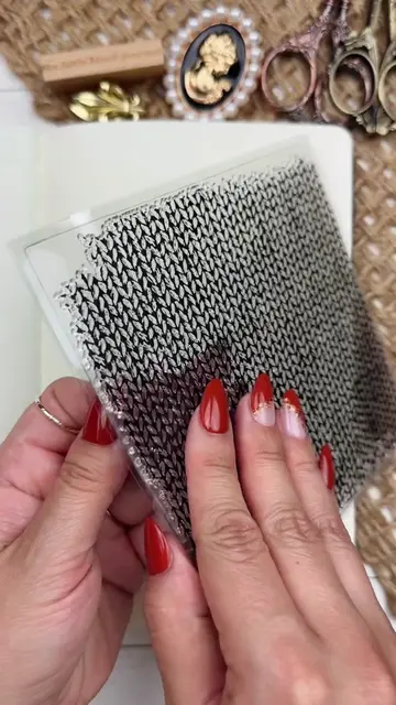 ASMR gothic scrapbook spread with shimmering burgundy ink