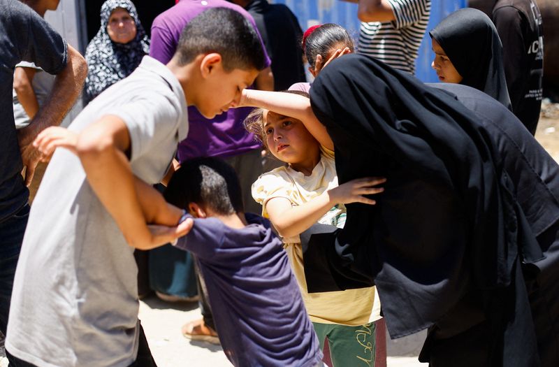 Israeli military takes more territory, kills two people in Gaza, medics ...