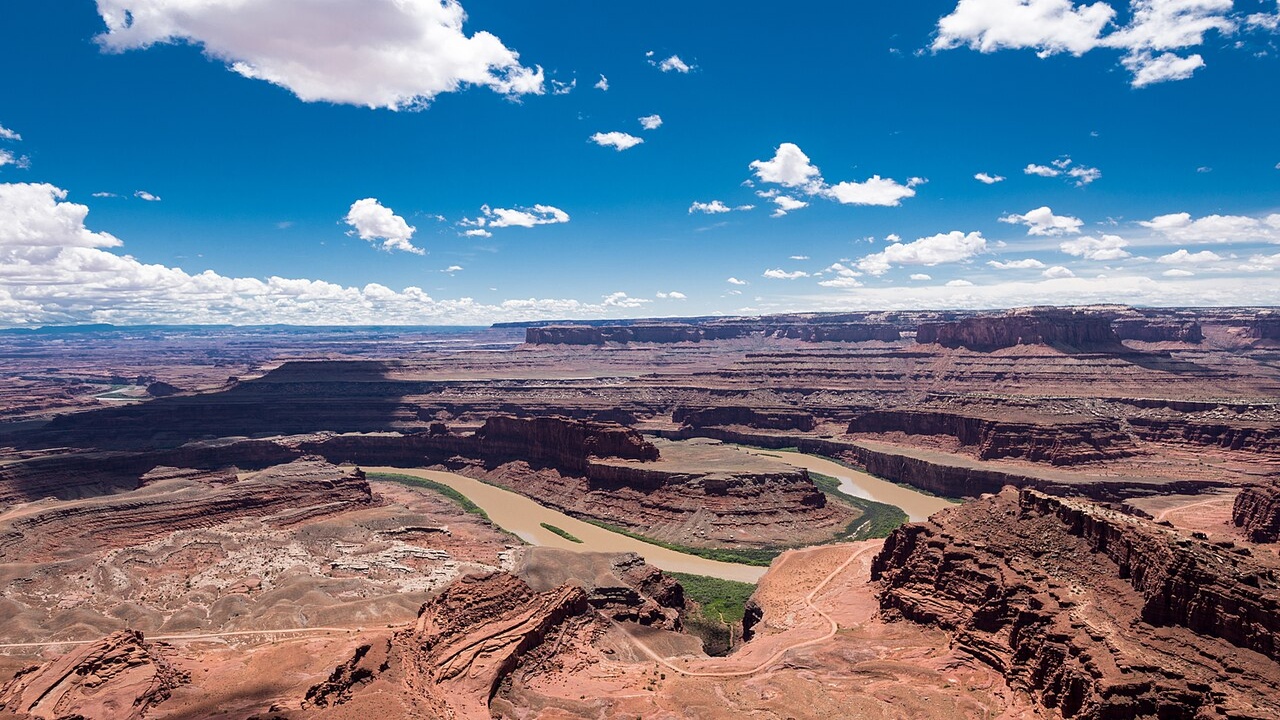 You stand 2,000 feet above the Colorado River at this grim-named Utah ...